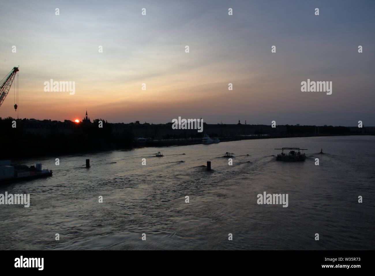 The skyline of Bordeaux at sunset Stock Photo - Alamy