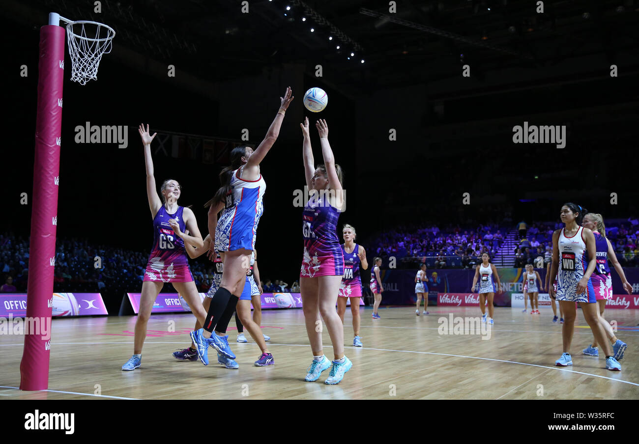Scotland's Emma Barrire shoots during the Netball World Cup match at ...