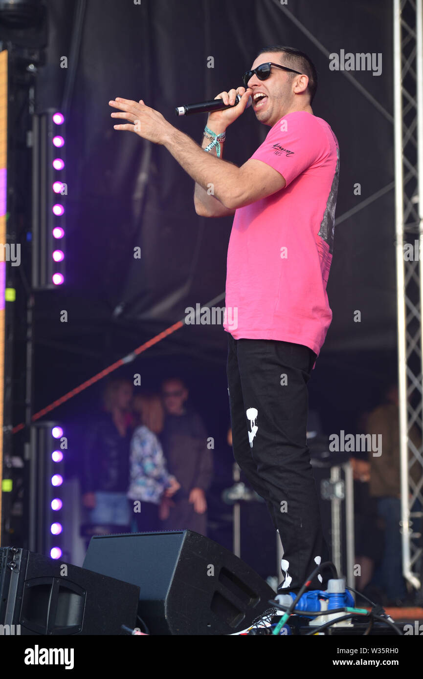Glasgow, UK. 12 July 2019. Example (AKA Elliot John Gleave) performing ...