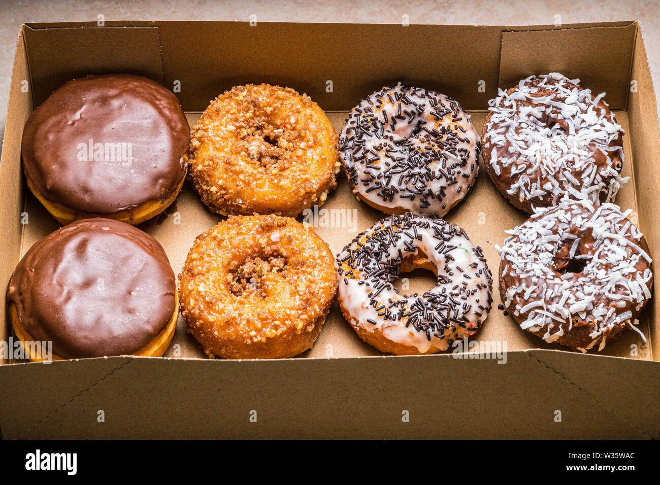 assorted donuts in paper box Stock Photo - Alamy