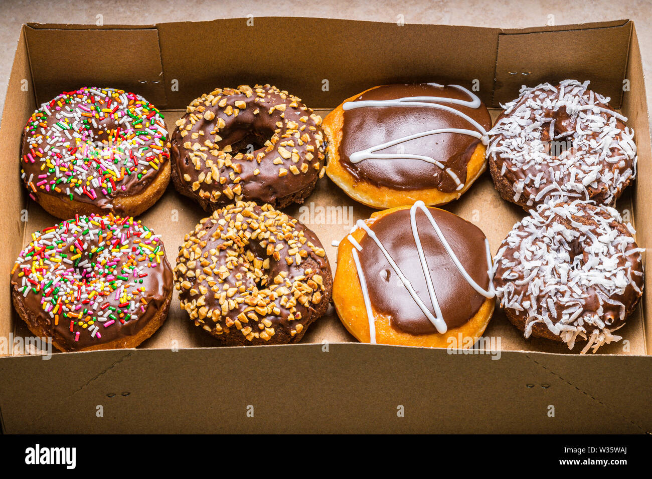 assorted donuts in paper box Stock Photo - Alamy