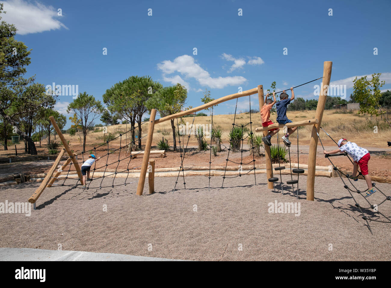 Athens, Greece. 12th July, 2019. Children play at a new playground ...
