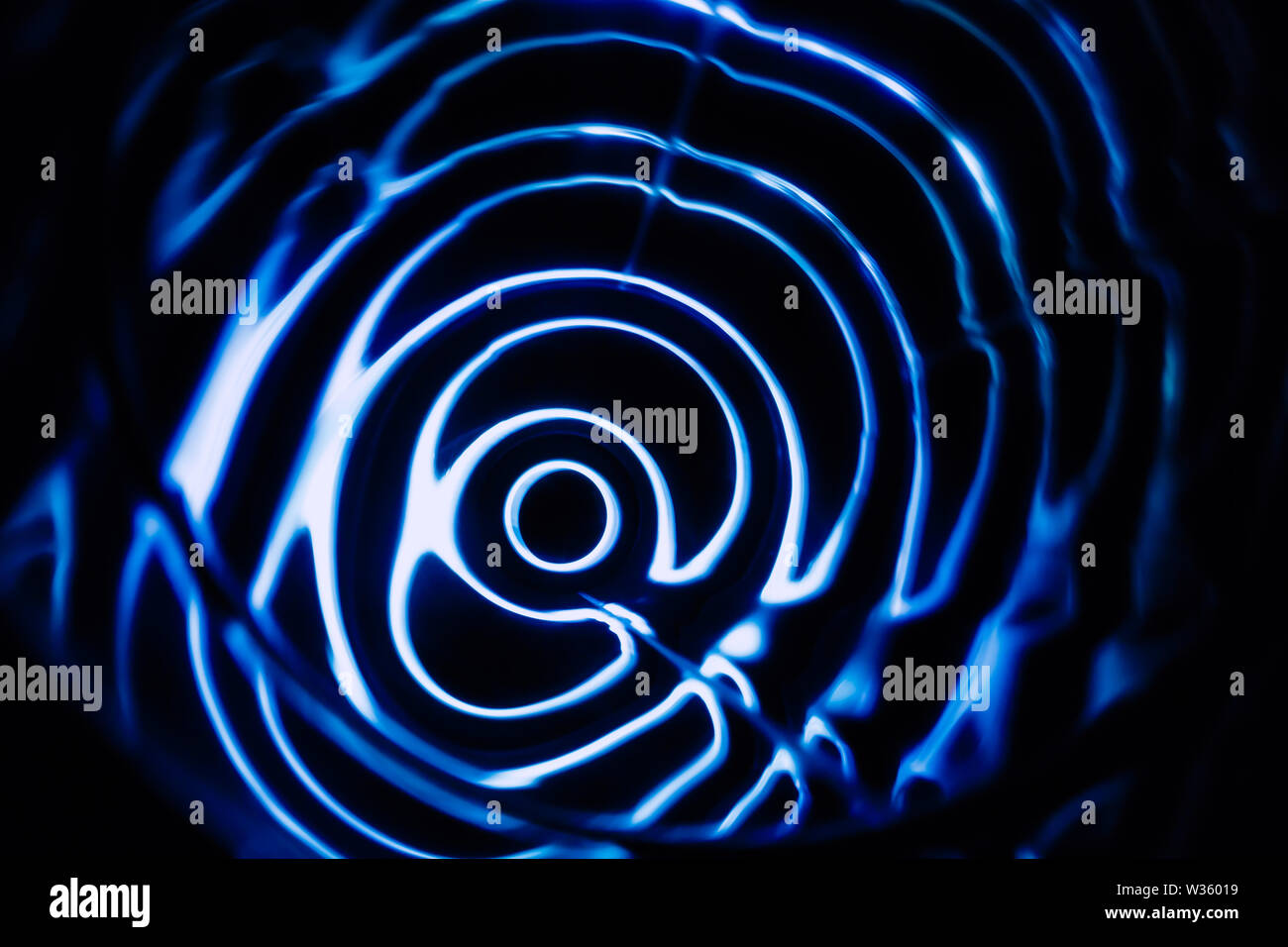 Sound waves in the dark. Blue color Stock Photo - Alamy