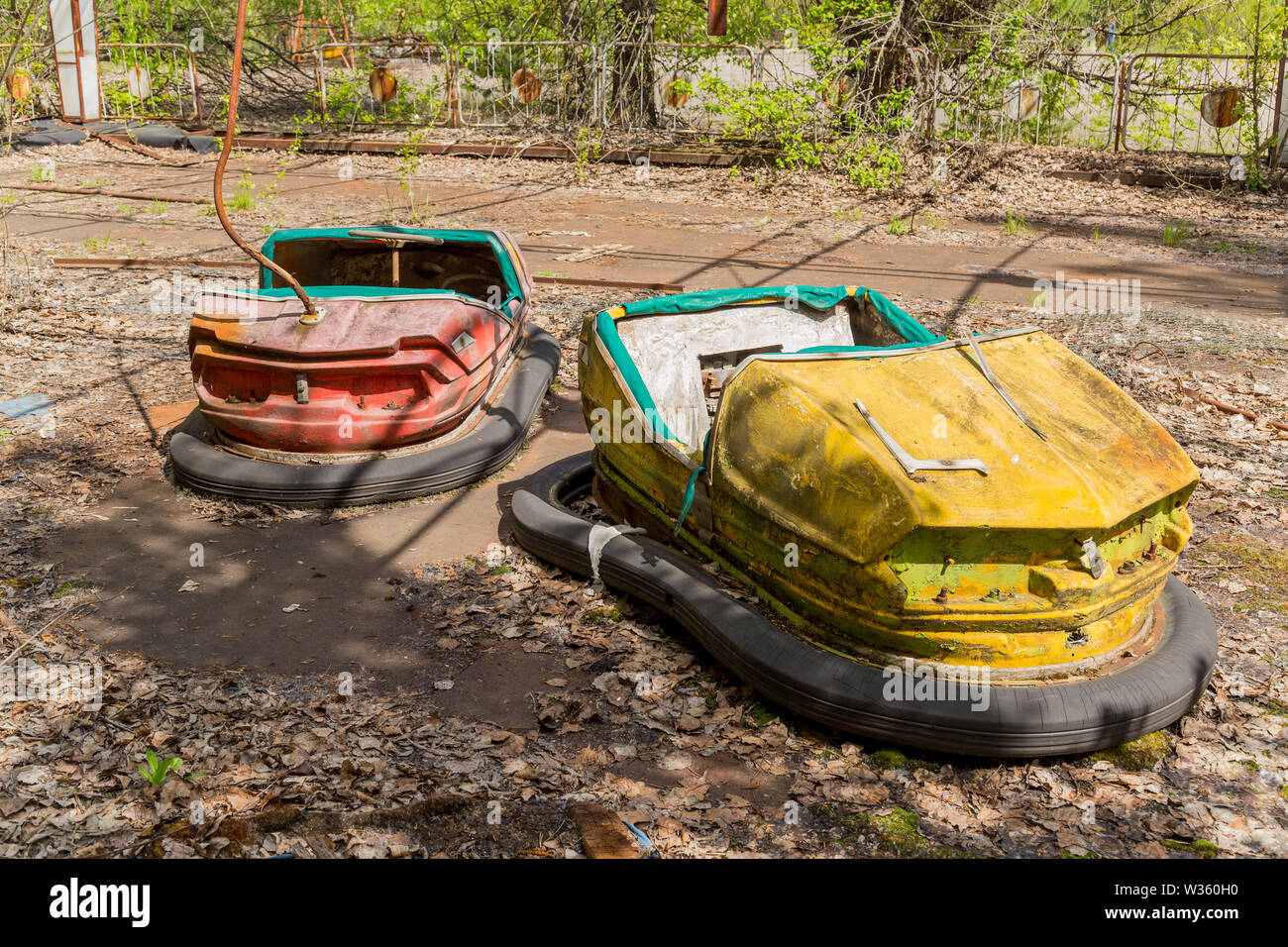 Old broken rusty metal radioactive children's electric cars abandoned ...