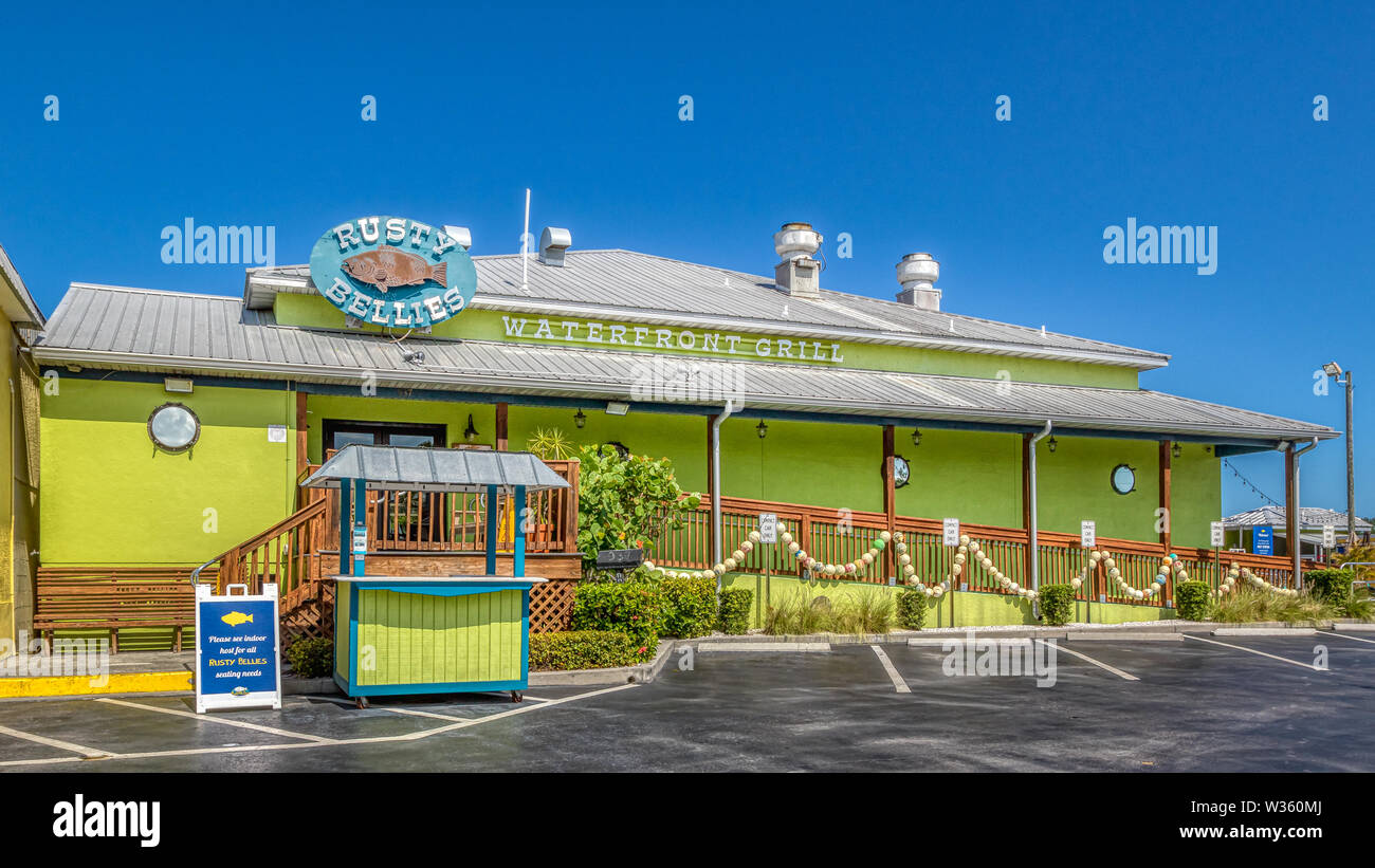 Tarpon Springs, Florida. Rusty Bellies bright green waterfront grill ...