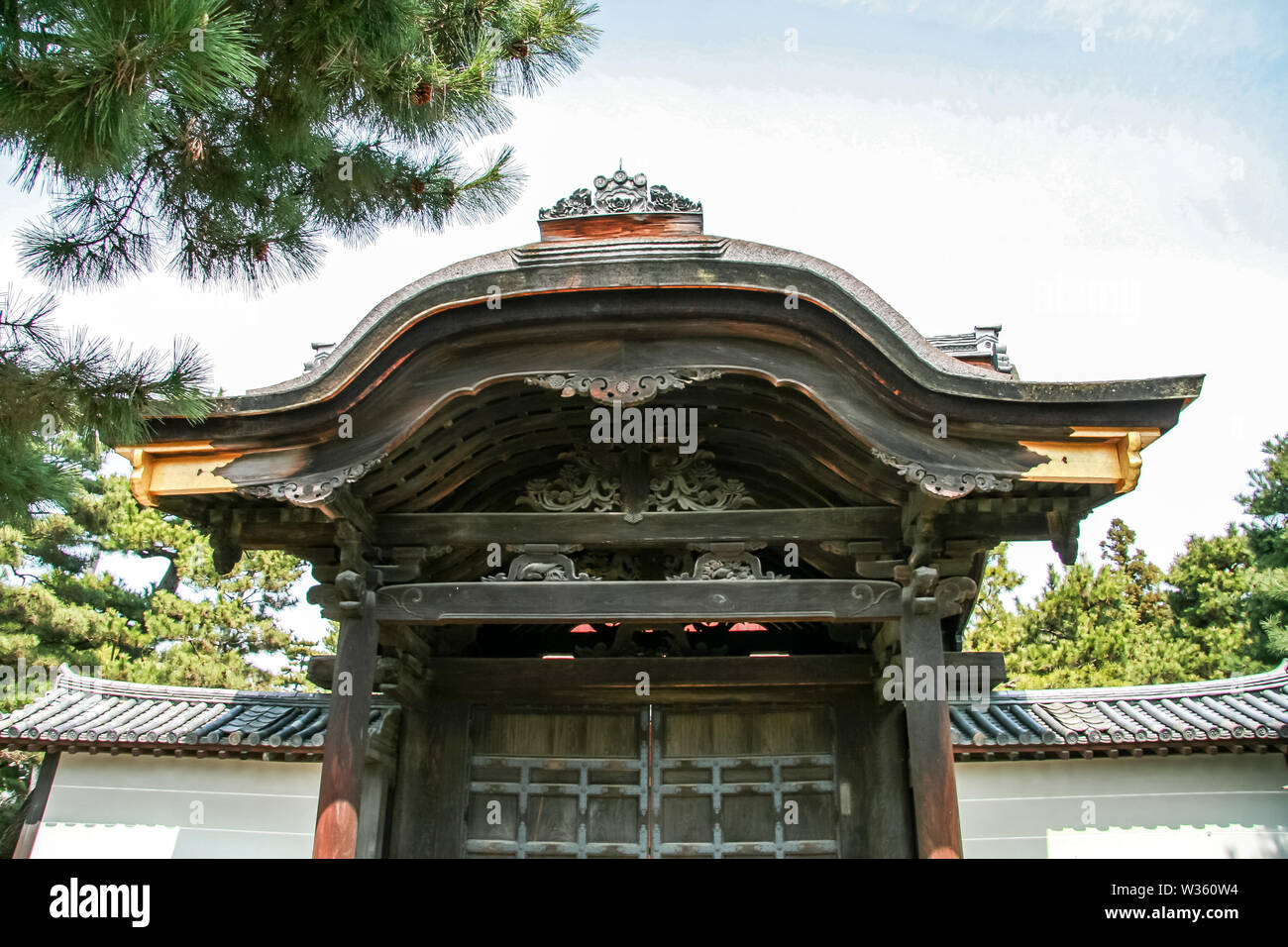 Japanese Feng shui garden with lake and bonsai trees, which radiates a ...