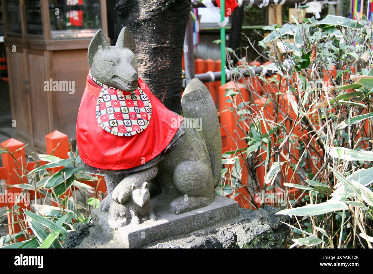 Japanese Feng shui garden with lake and bonsai trees, which radiates a ...