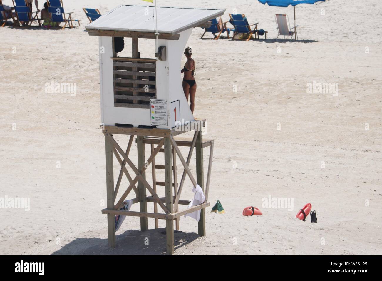 A lifeguard on the beach Stock Photo - Alamy
