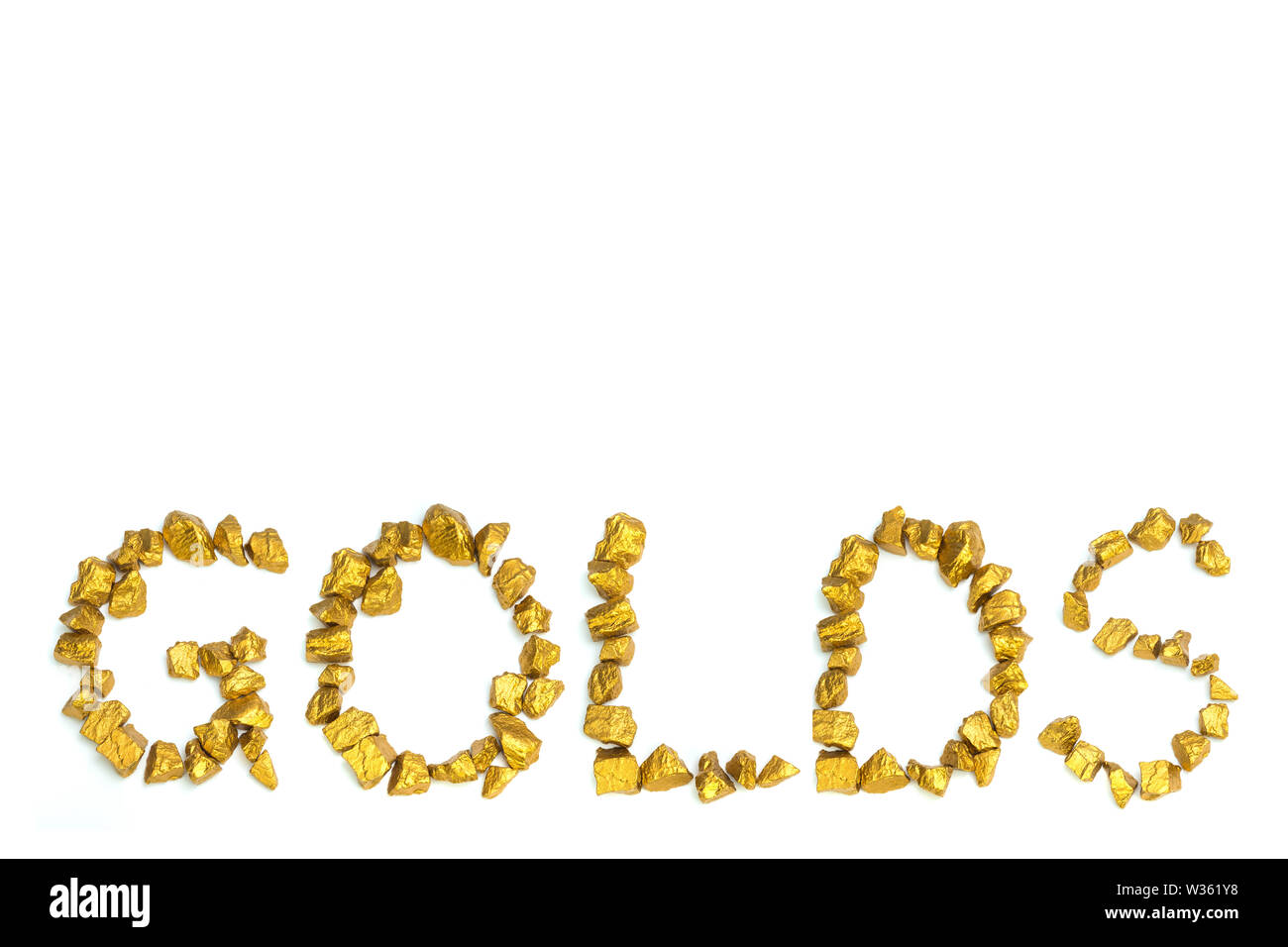 GOLDS word text arranged by gold nuggets on white background, business ...