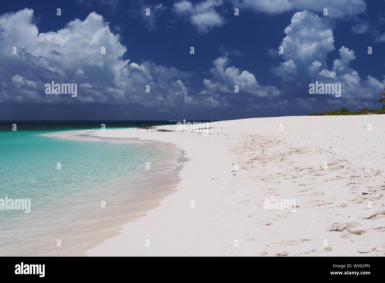 Pure white sand, turquoise (crystal clear) waters and perfect blue sky ...