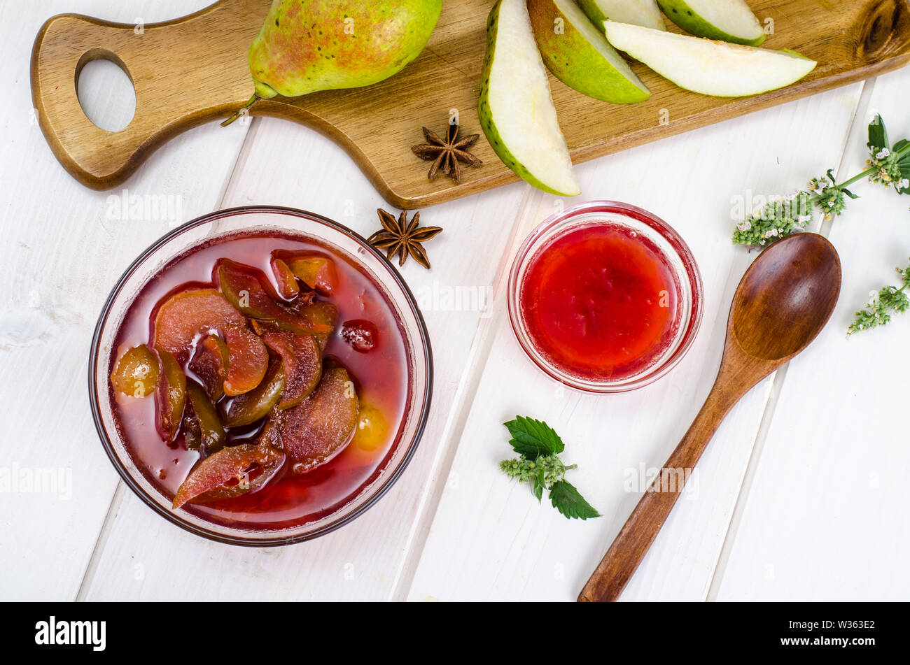 Jam from pears and apples in sweet syrup. Studio Photo Stock Photo - Alamy
