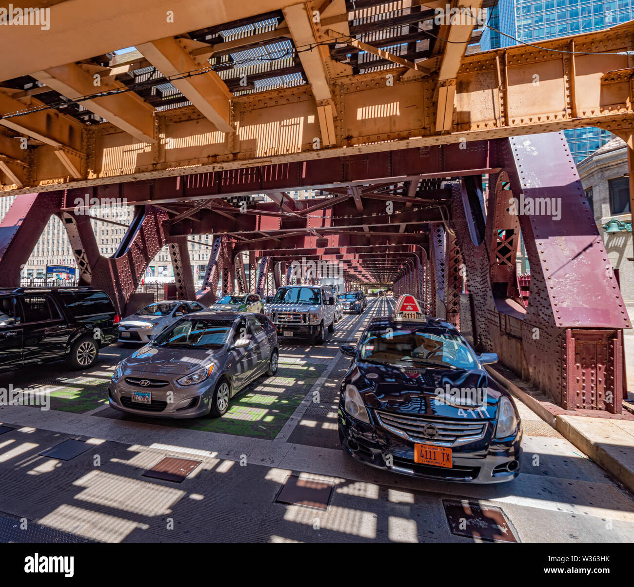 Overground train tracks over the streets in Chicago - CHICAGO, USA ...