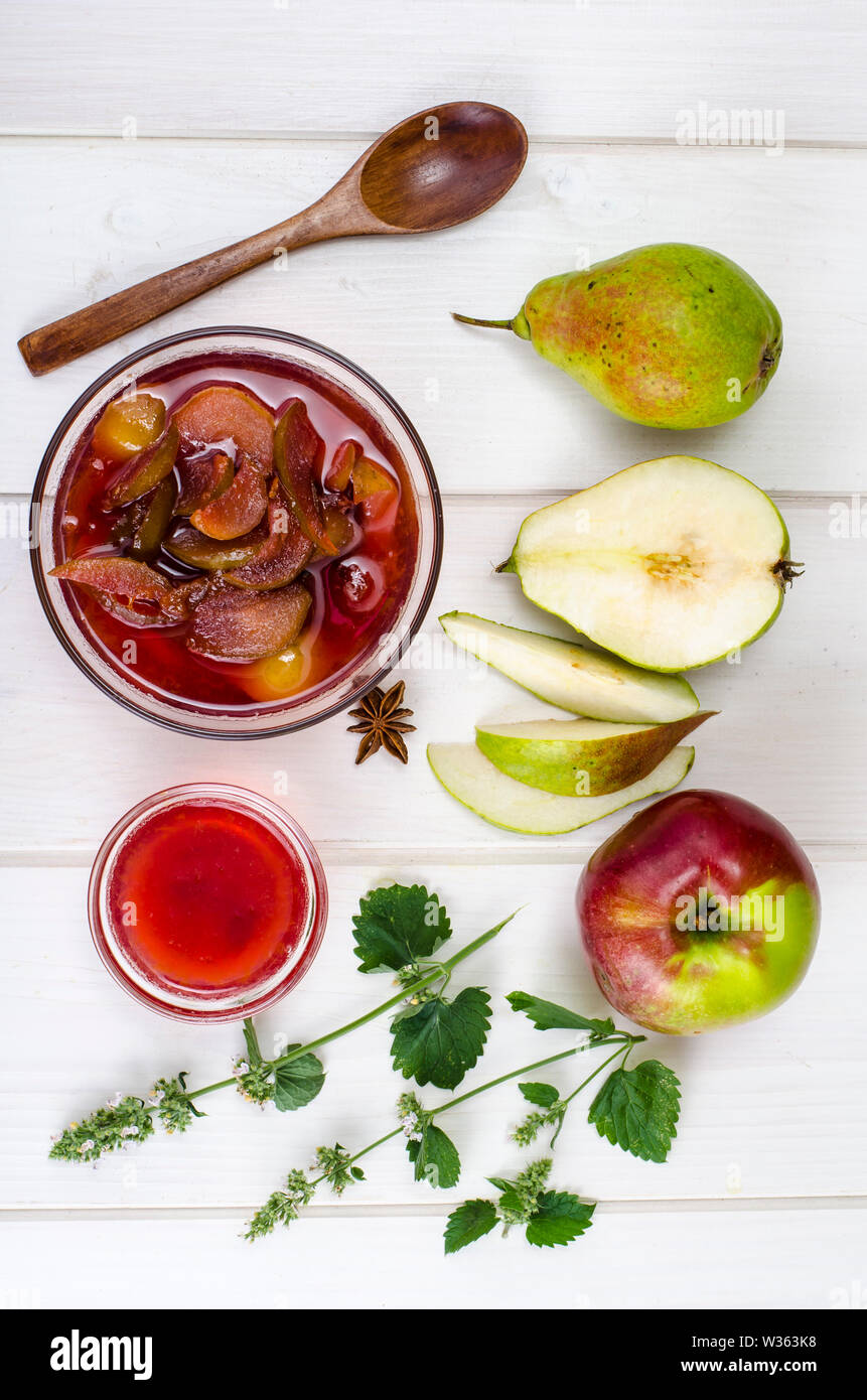 Jam from pears and apples in sweet syrup. Studio Photo Stock Photo - Alamy