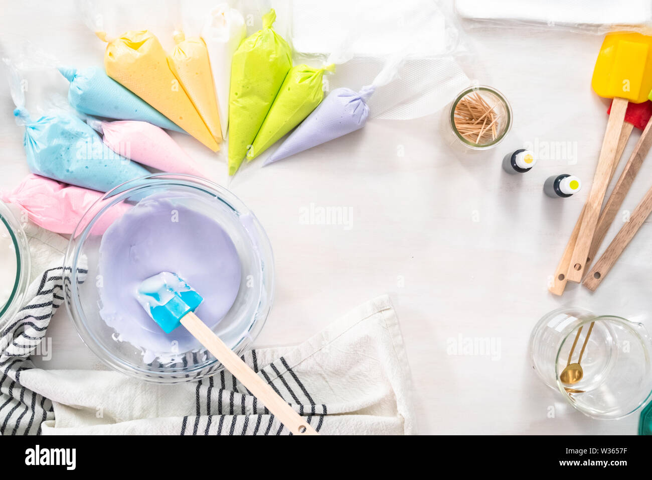 Flat lay. Making royal icing to decorate Easter sugar cookies Stock ...