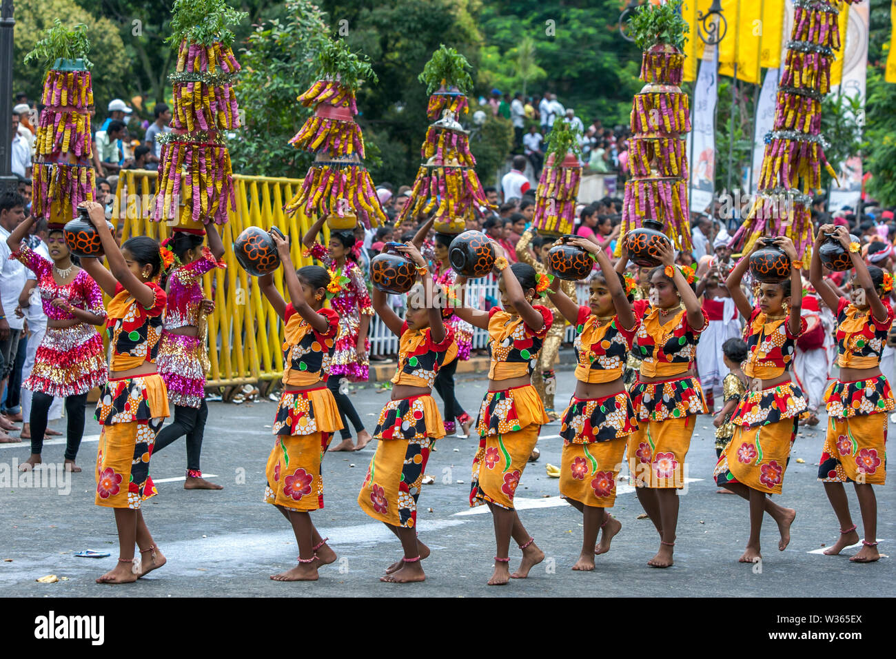 Procession of the Paththini Devala dancers perform to honour the ...