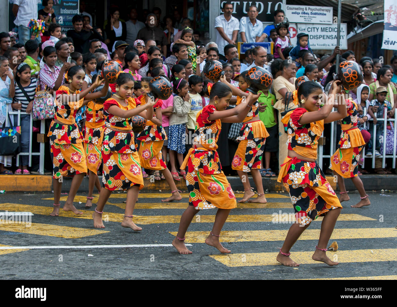 Procession of the Paththini Devala dancers perform to honour the ...