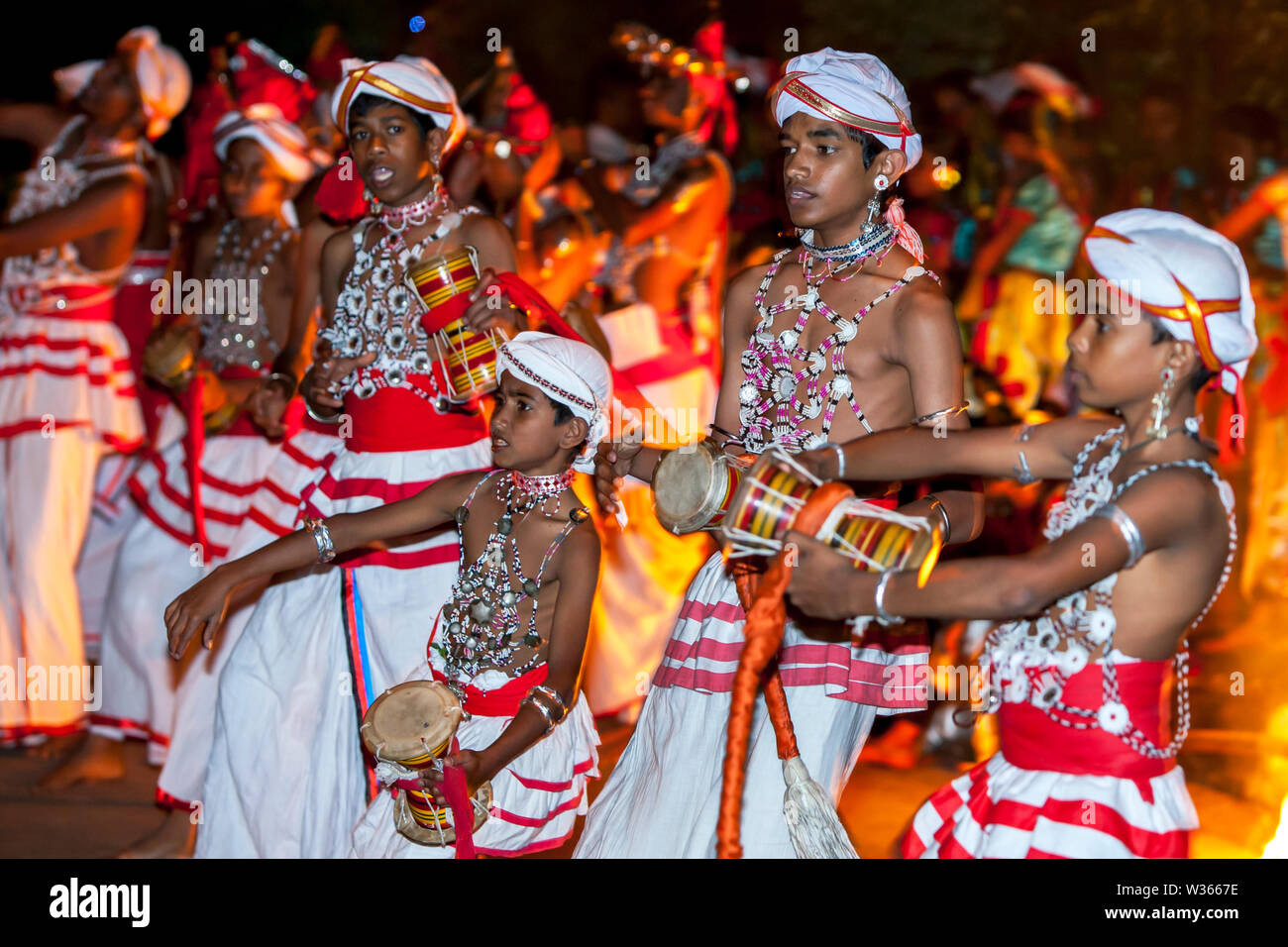 Udekki Players perform at the Buddhist Esala Perahara (great procession ...