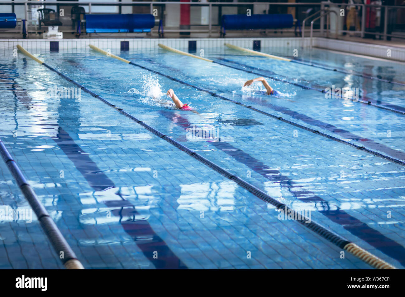 Swimmers in a pool Stock Photo - Alamy