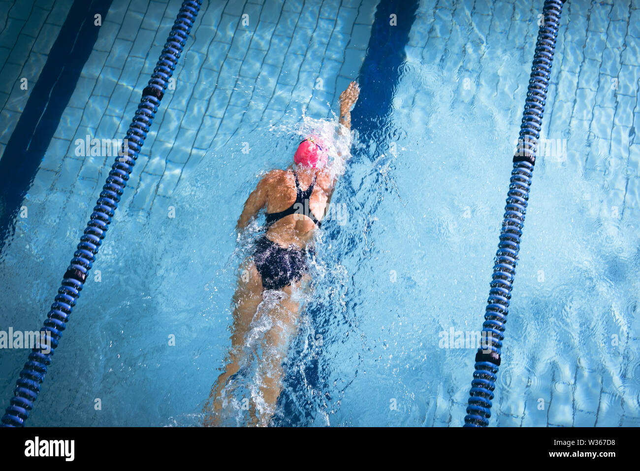 Swimmer in a pool Stock Photo - Alamy