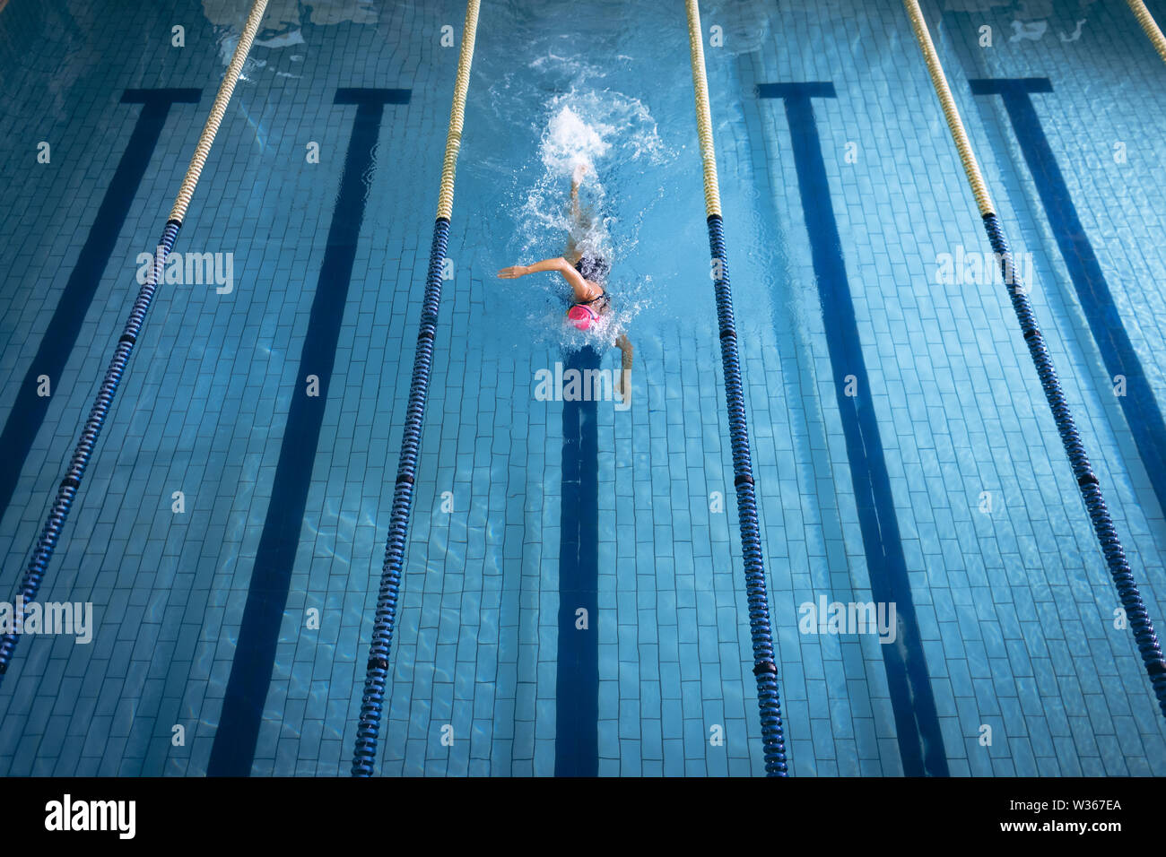 Swimmer in a pool Stock Photo - Alamy