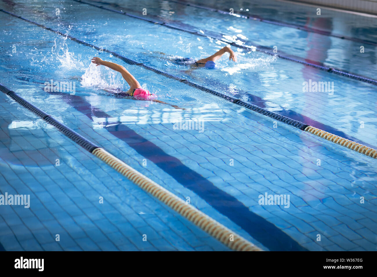 Swimmers in a pool Stock Photo - Alamy