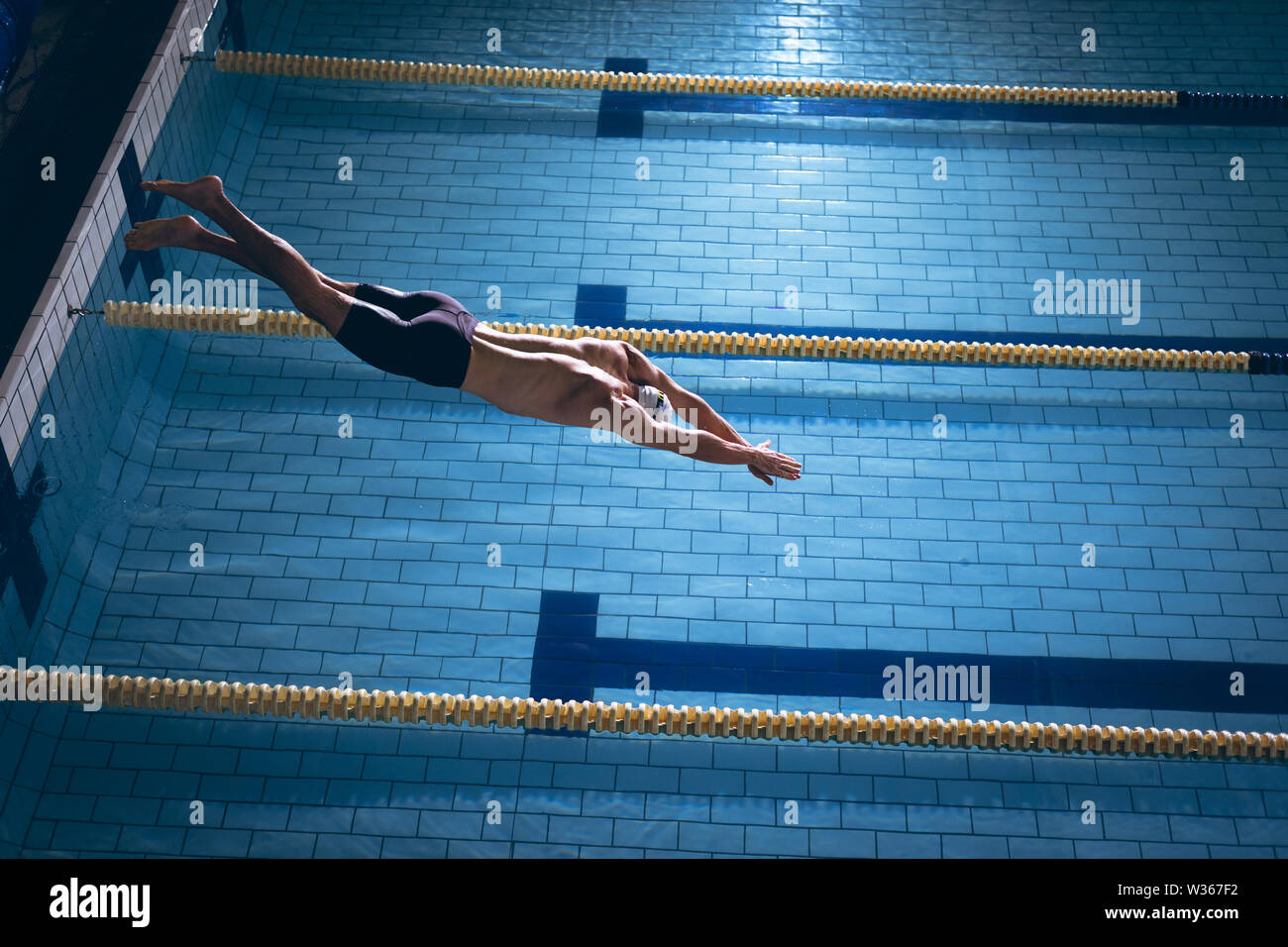 Swimmer in a pool Stock Photo - Alamy