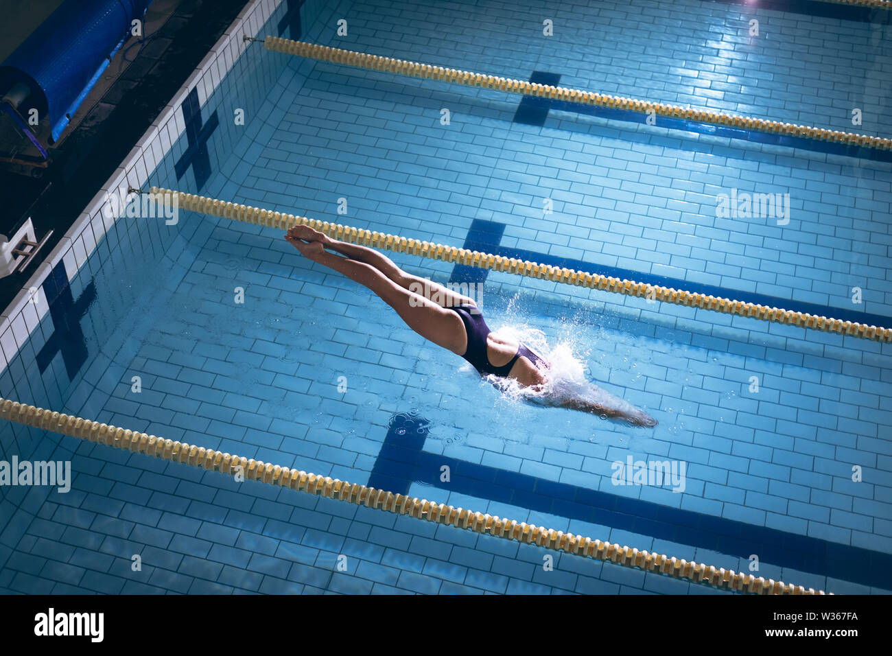 Swimmer in a pool Stock Photo - Alamy
