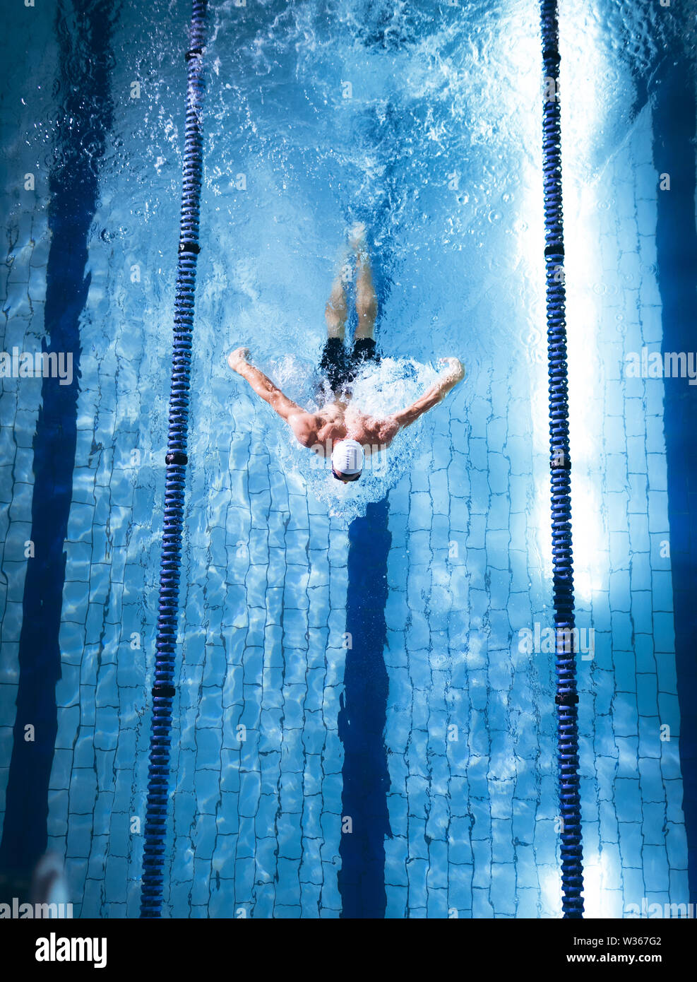 Swimmer in a pool Stock Photo - Alamy