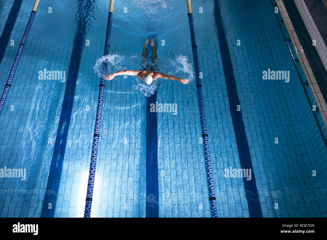 Swimmer in a pool Stock Photo - Alamy