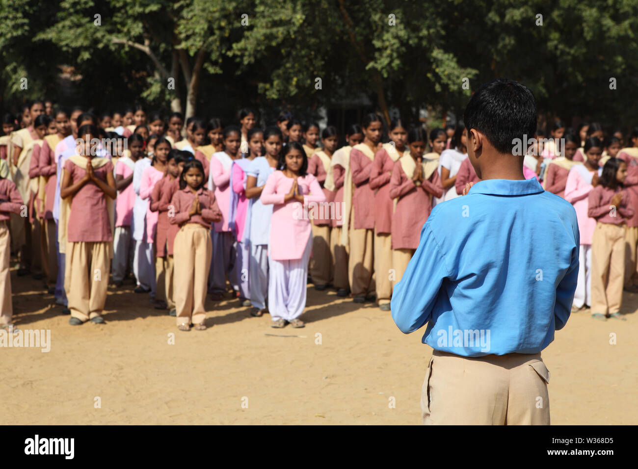 School children praying during assembly at school Stock Photo - Alamy