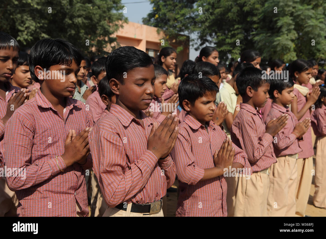 Indian school children praying during assembly at school Stock Photo ...