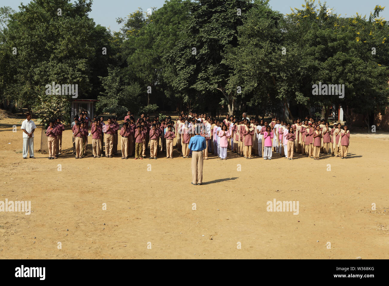 School children praying during assembly at school Stock Photo - Alamy