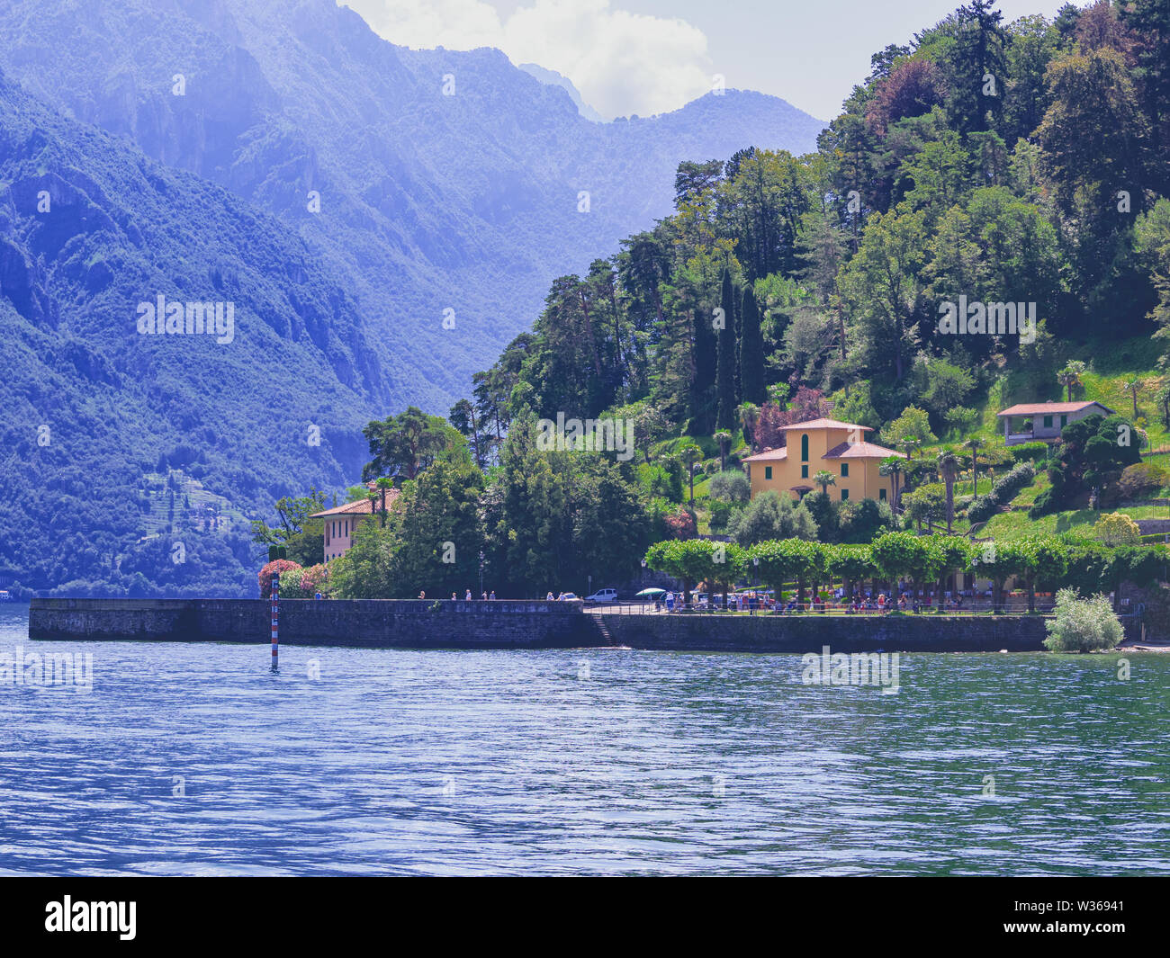 the Bellagio promontory, elegant buildings surrounded by lush parks by ...