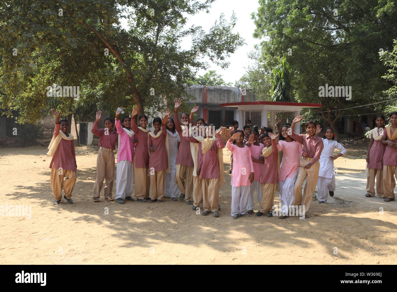 School boy waving his hand hi-res stock photography and images - Alamy
