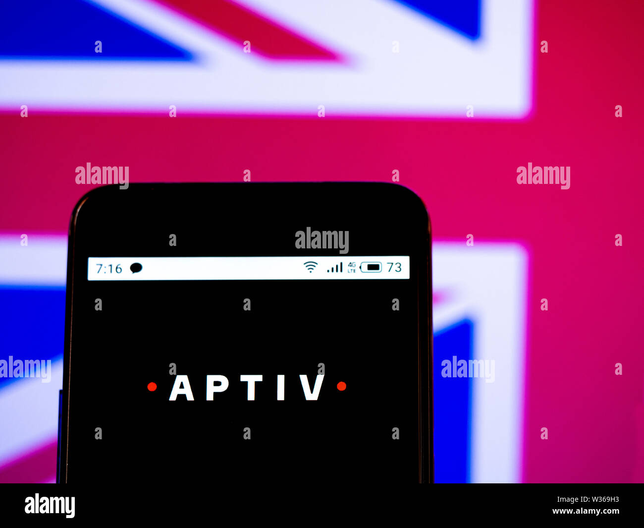 In this photo illustration the Aptiv Plc logo is seen displayed on a ...