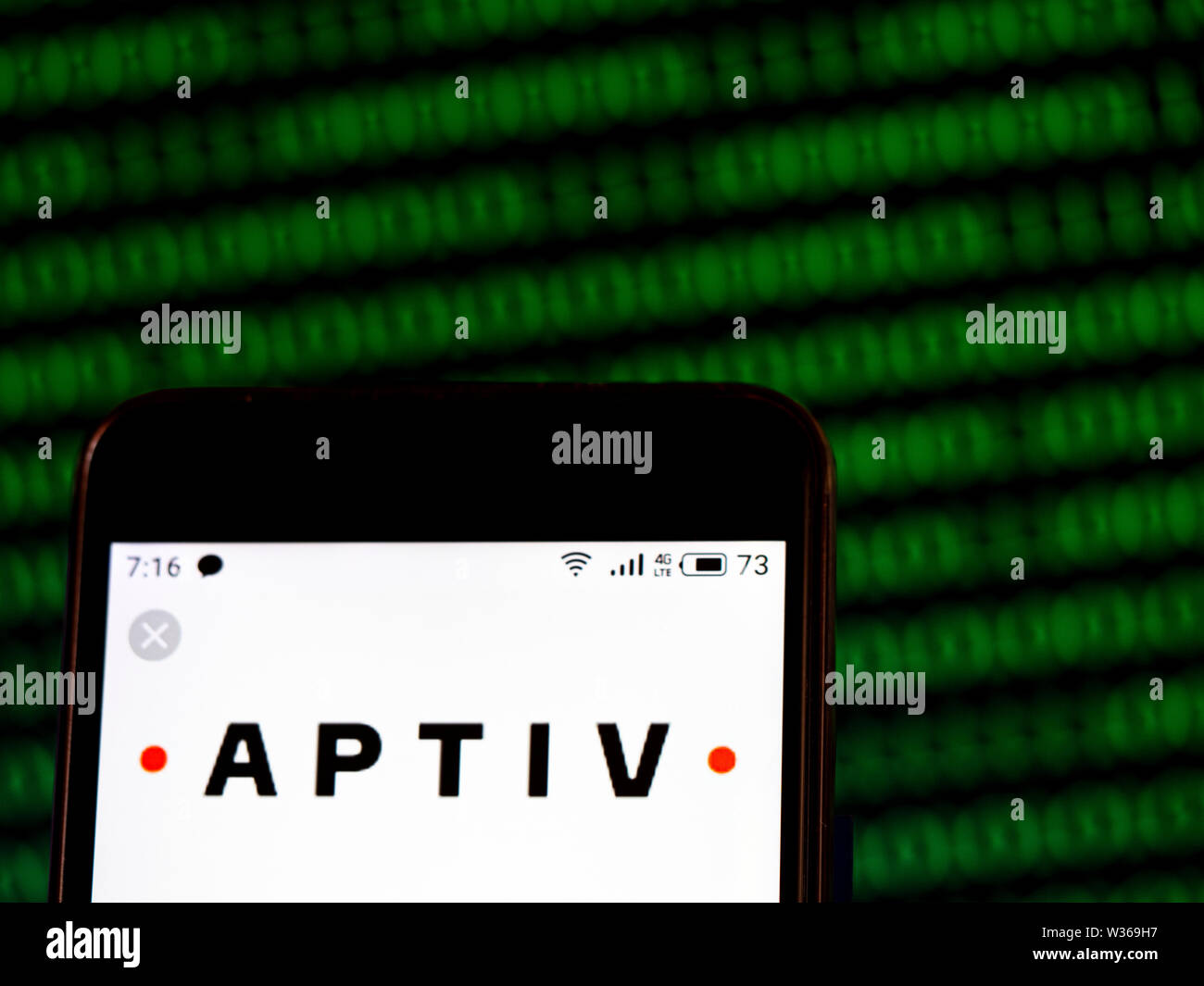 In this photo illustration the Aptiv Plc logo is seen displayed on a ...