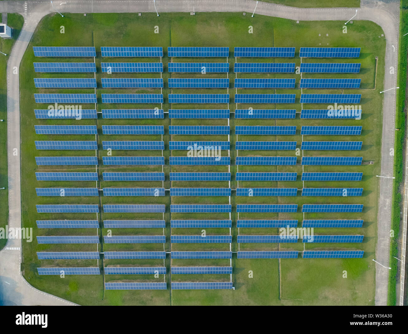 Aerial view of Solar Panels Farm with sunlight. Drone flight over solar ...