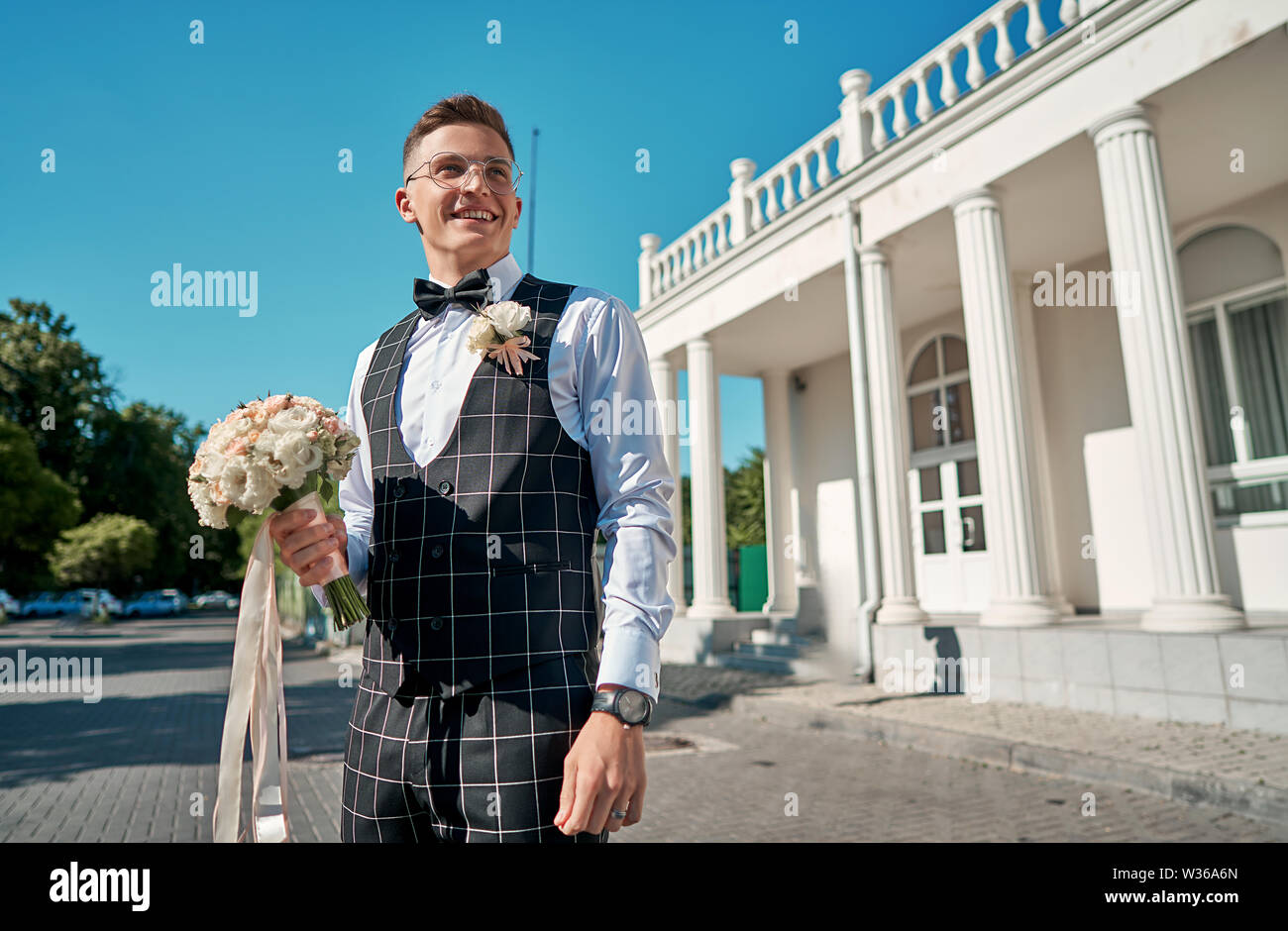 Businessman holding bouquet hi-res stock photography and images - Alamy