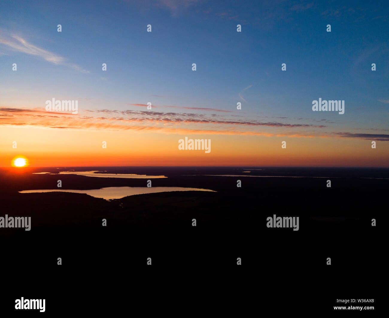 Aerial view sunset sky background. Dramatic gold sunset sky with ...