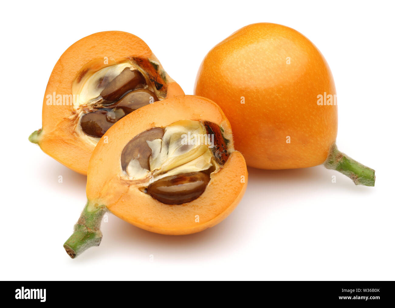 Ripe loquat fruits isolated on white background Stock Photo - Alamy
