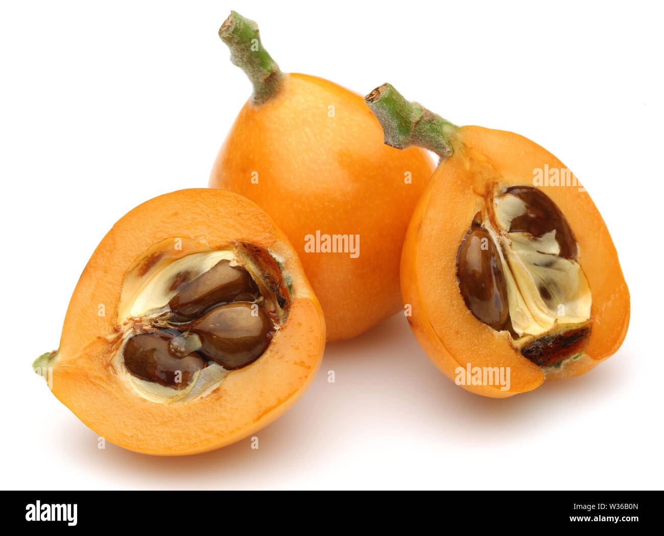 Ripe loquat fruits isolated on white background Stock Photo - Alamy