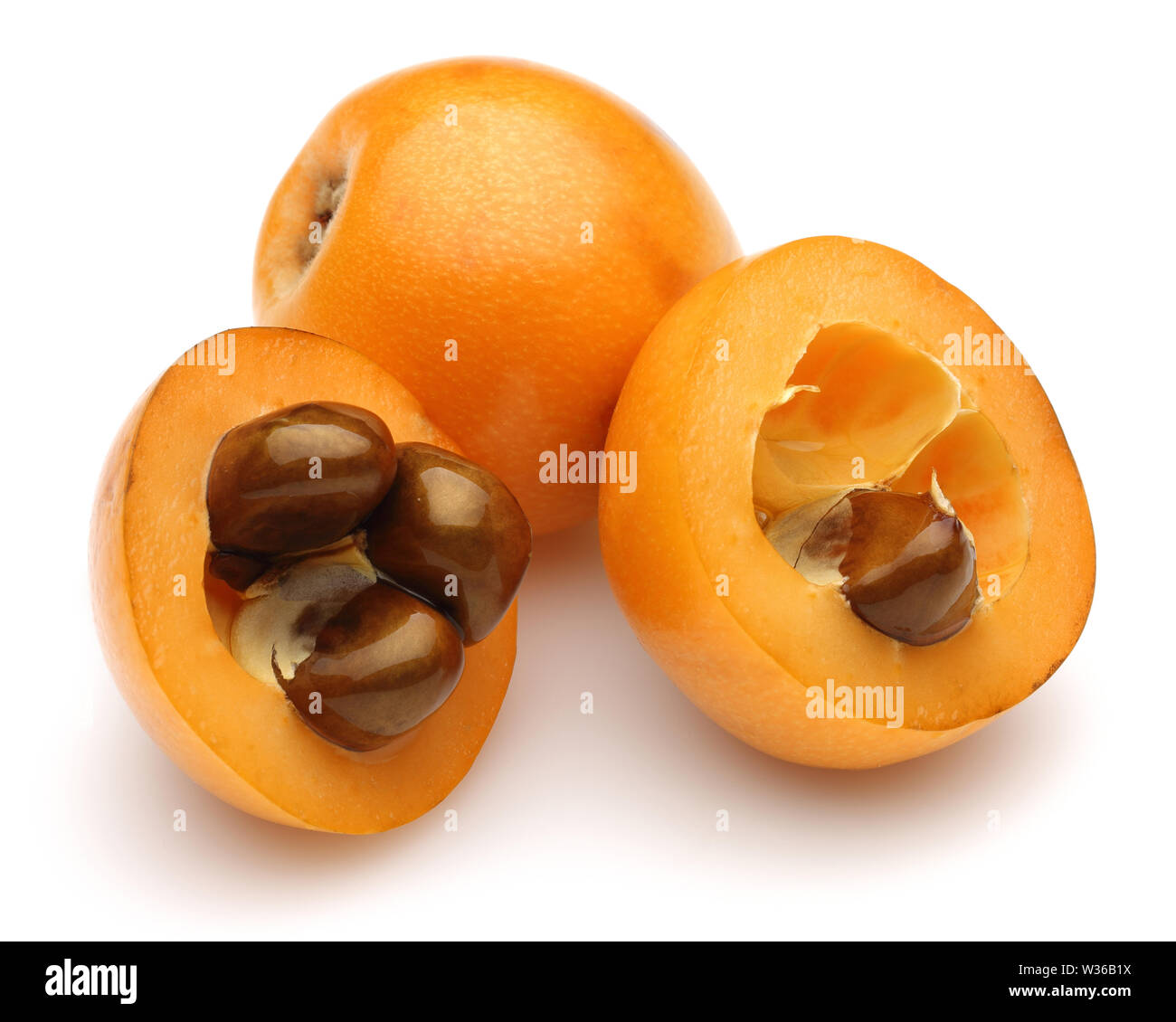 Ripe loquat fruits isolated on white background Stock Photo - Alamy