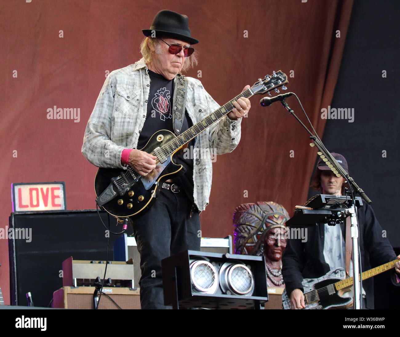 London, UK. 12th July, 2019. Neil Young performs on stage at London's ...