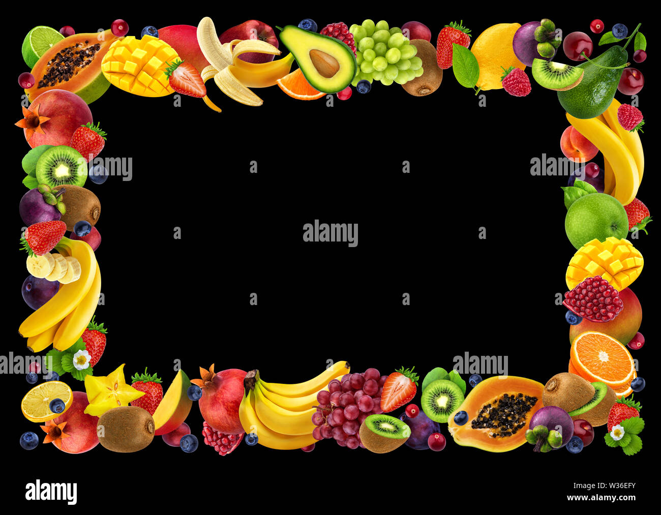 Frame made of different fruits and berries, on black background Stock ...