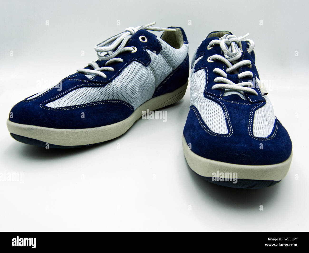Sneakers isolated on white background Stock Photo - Alamy
