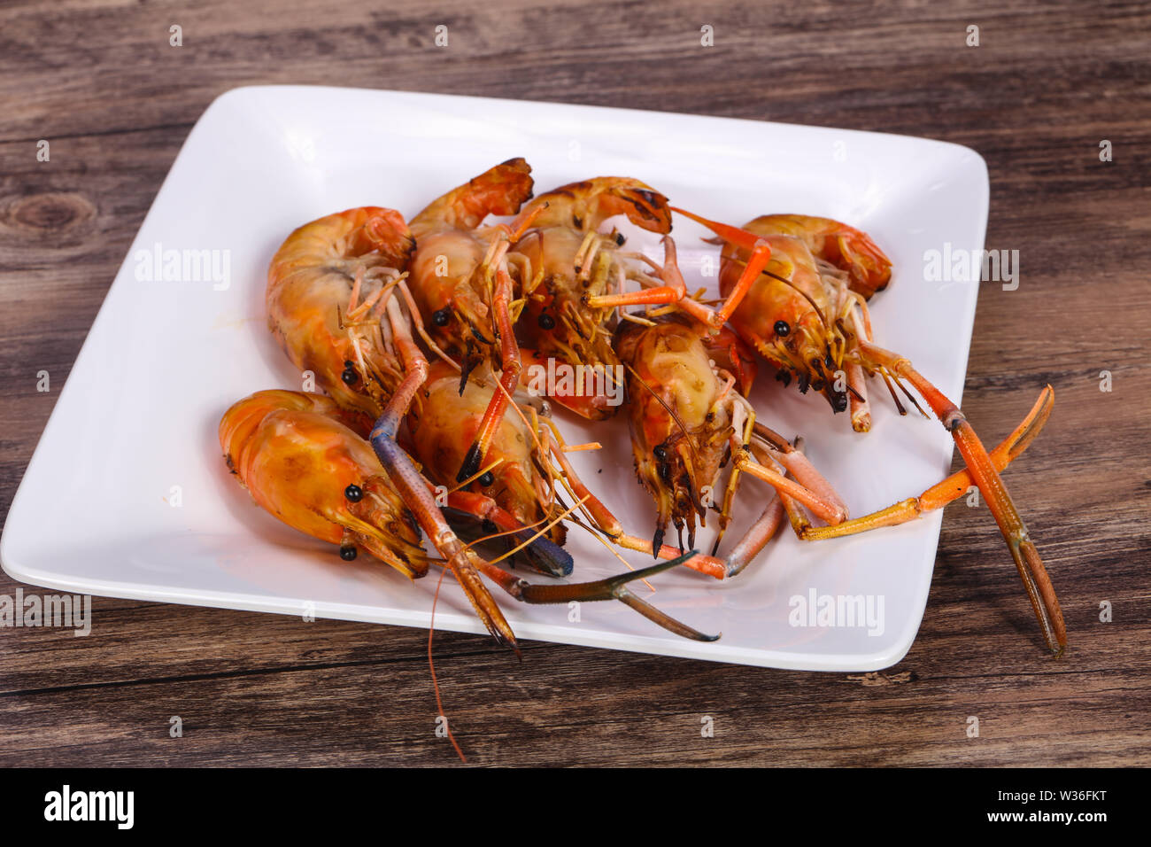 Grilled Asian water prawn in the plate Stock Photo - Alamy