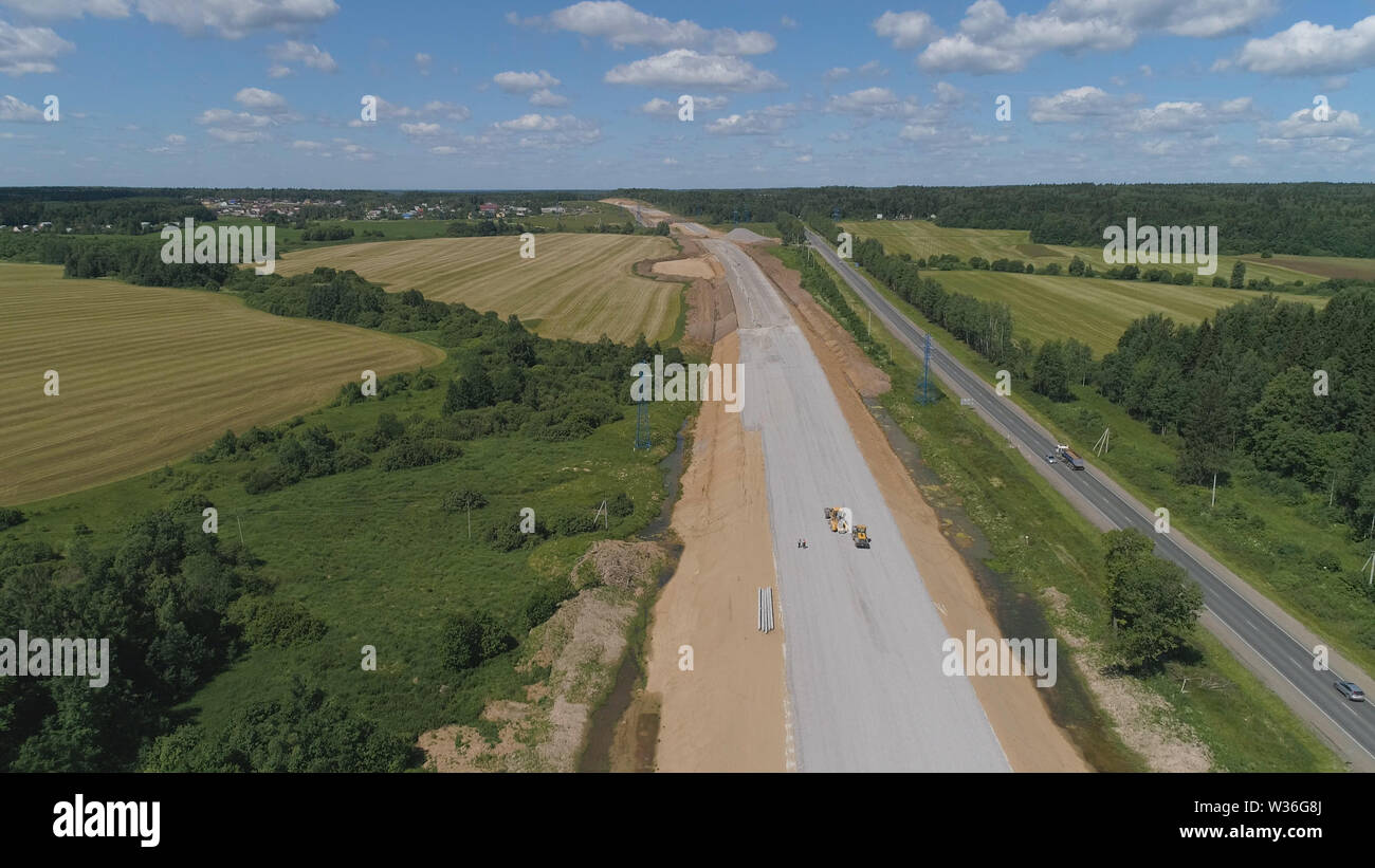 Construction of toll roads in rural areas. Aerial view construction of ...