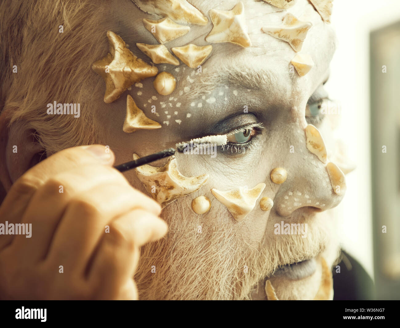 Senior male model in backstage. Theatre and cinema concept. Man with ...