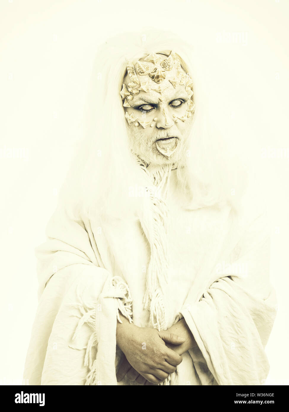 Monster with thorns and warts on face. Demon with dragon skin and grey ...