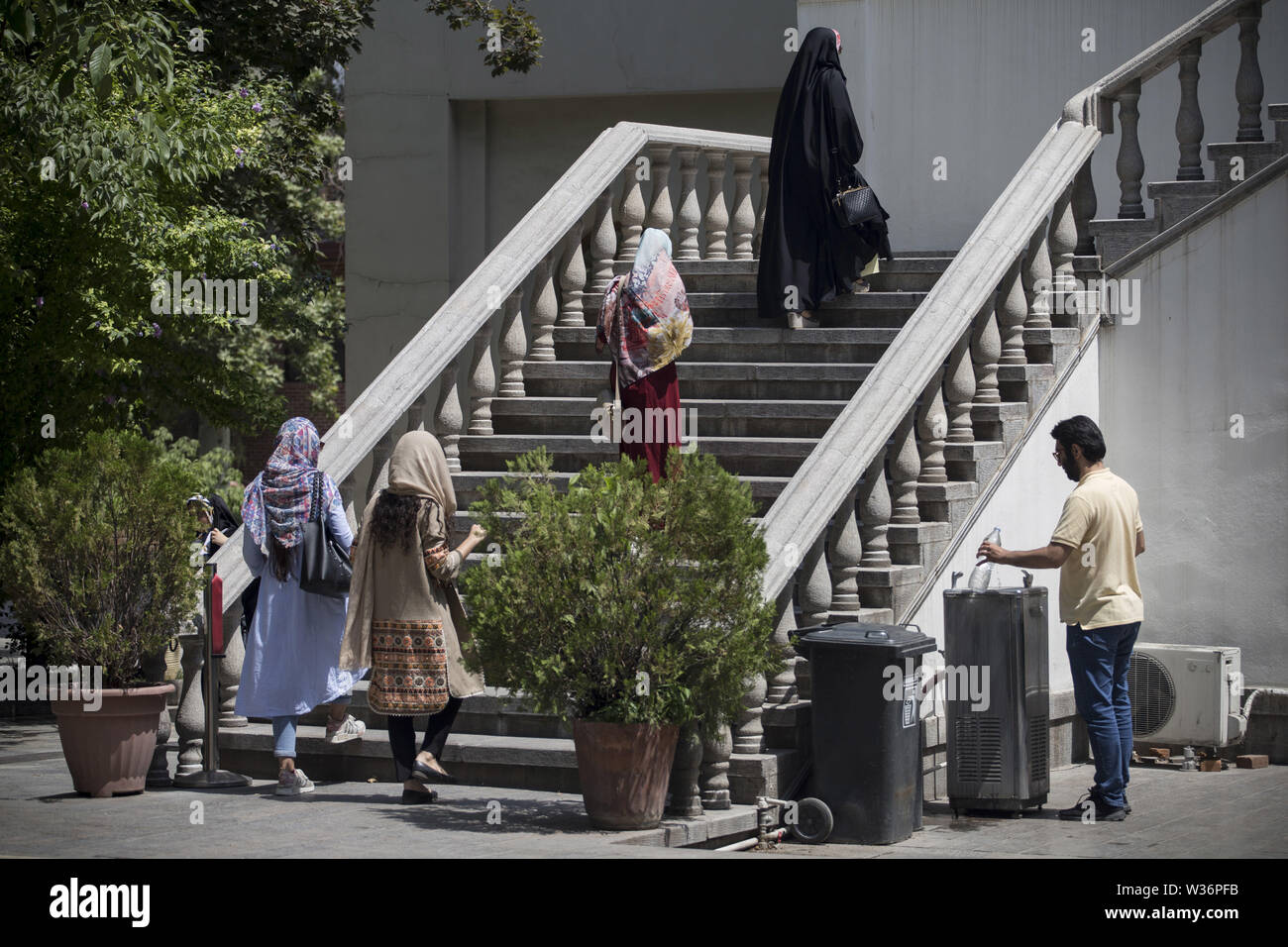 Tehran, Tehran, IRAN. 11th July, 2019. People walk in the Ferdows ...